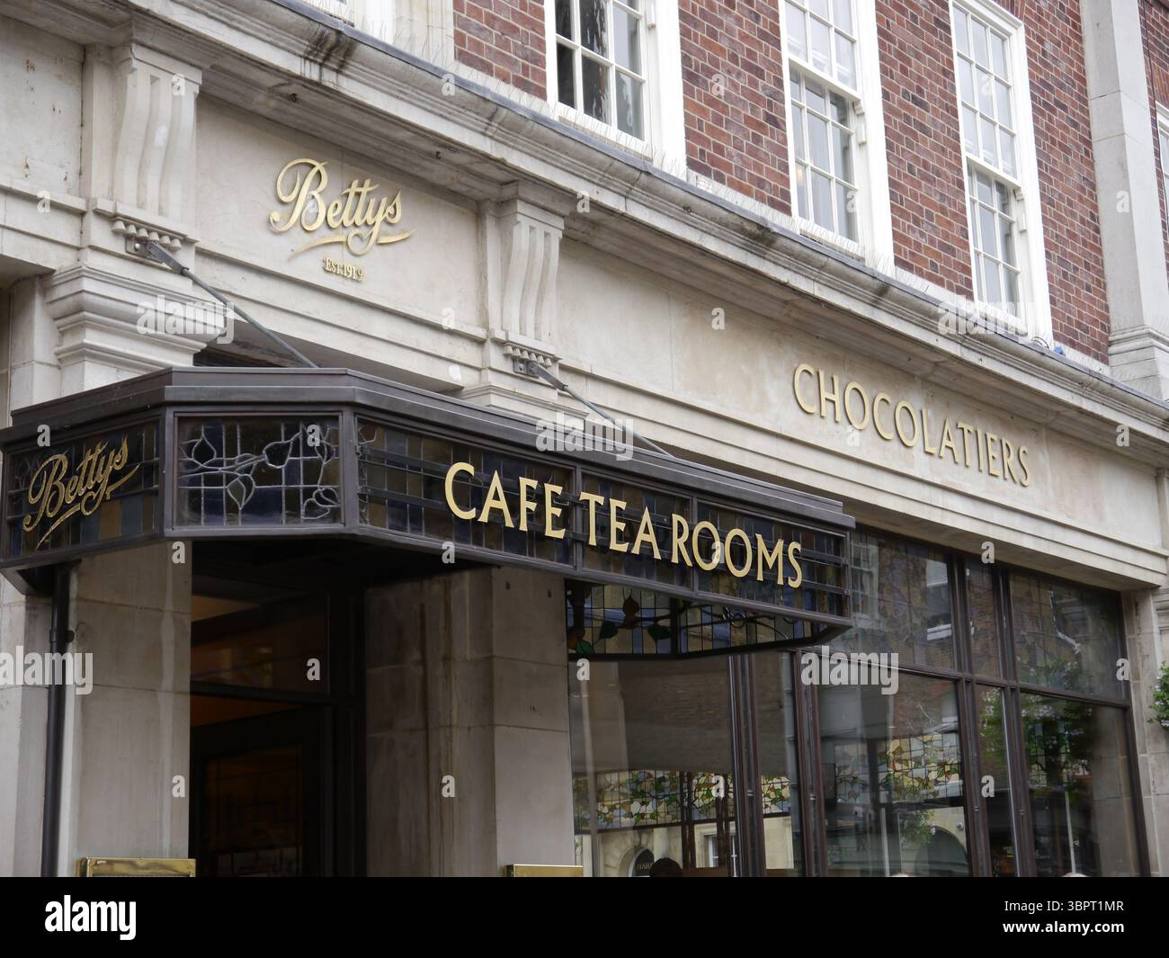 Betty’s tea rooms cafe Corporate logo signs in York City centre in June ...