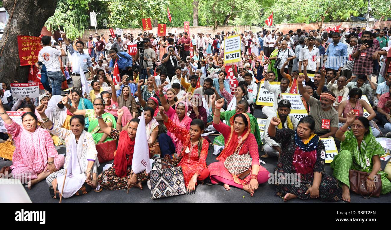 NEW DELHI, INDIA - JULY 9: Members of different trade unions shout ...