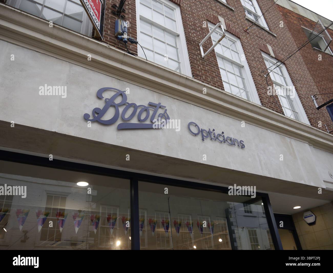 Boots opticians Corporate logo signs in York City centre in June 2025 ...