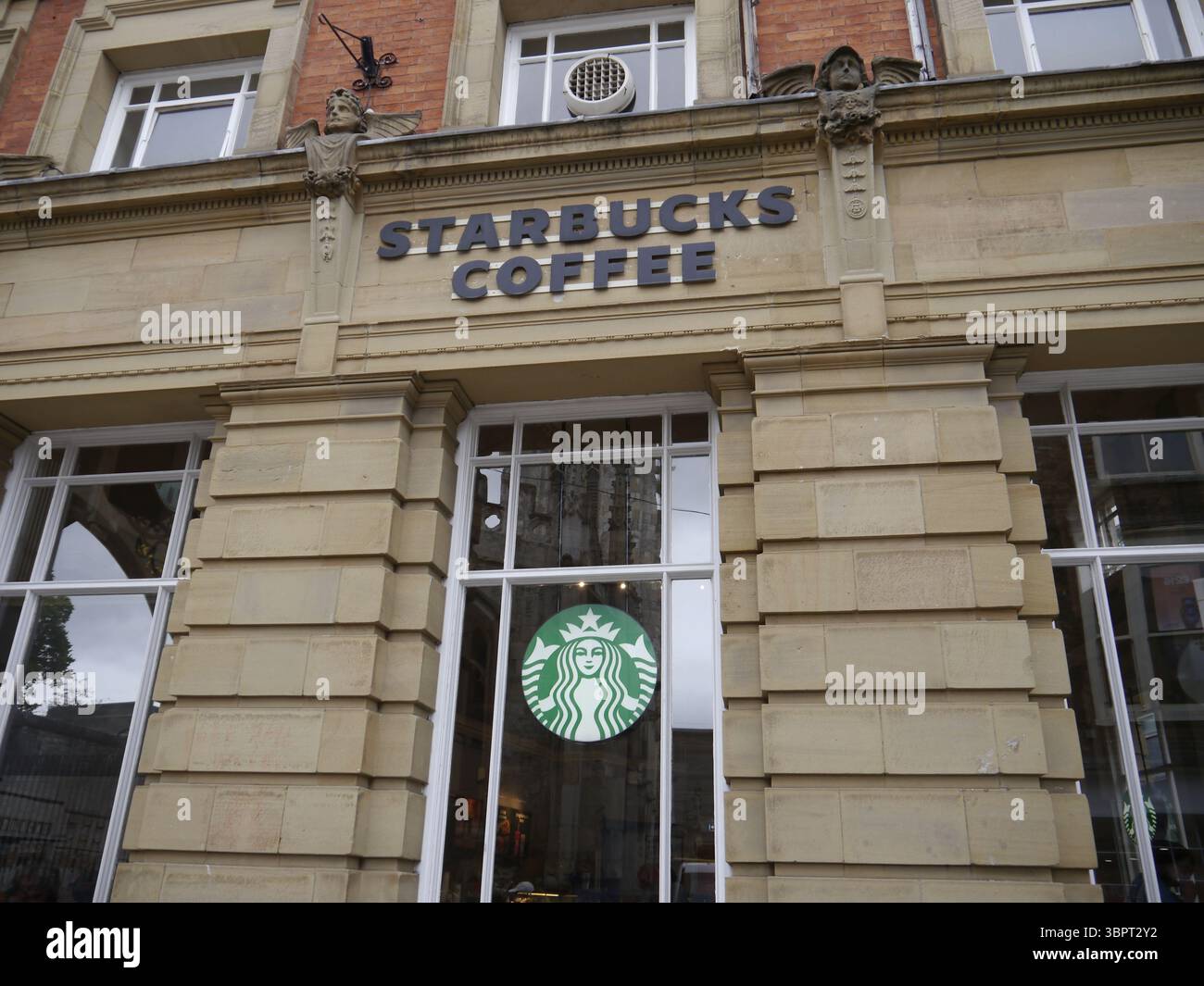 Starbucks coffee Corporate logo signs in York City centre in June 2025 ...