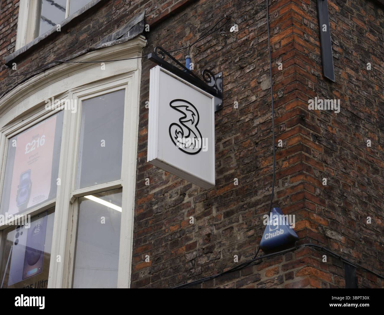 three telecom 3 , mobile phone cell company Corporate logo signs in ...