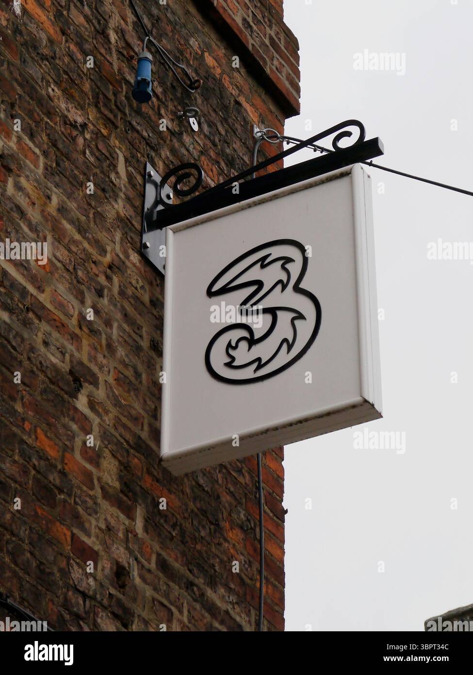 three telecom 3 , mobile phone cell company Corporate logo signs in ...