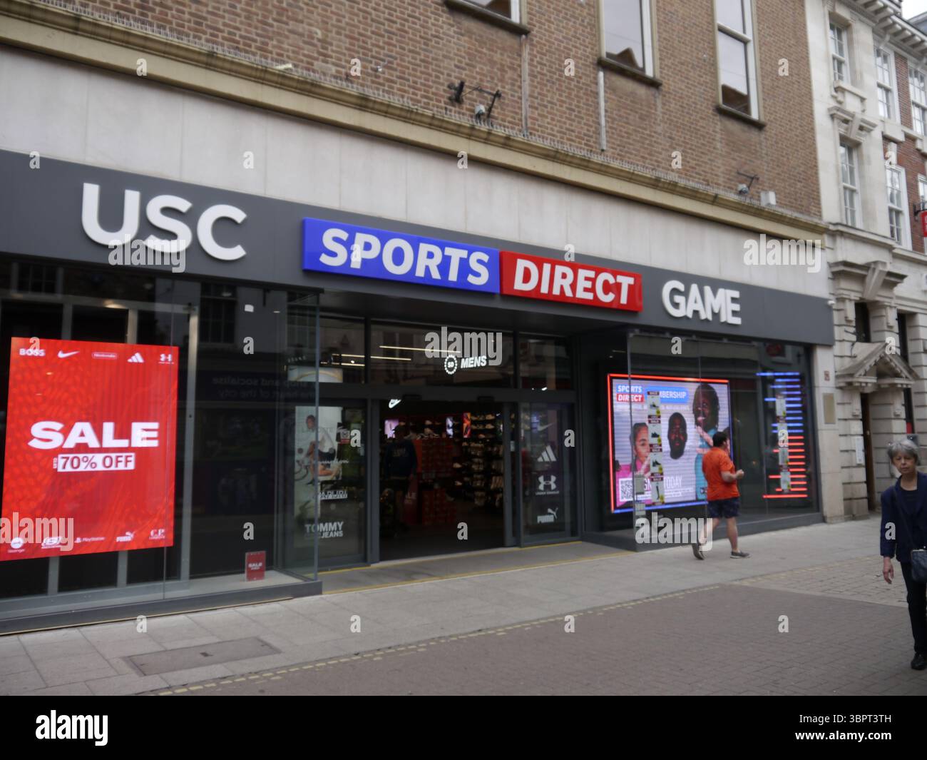 sports direct game, USC, Corporate logo signs in York City centre in ...
