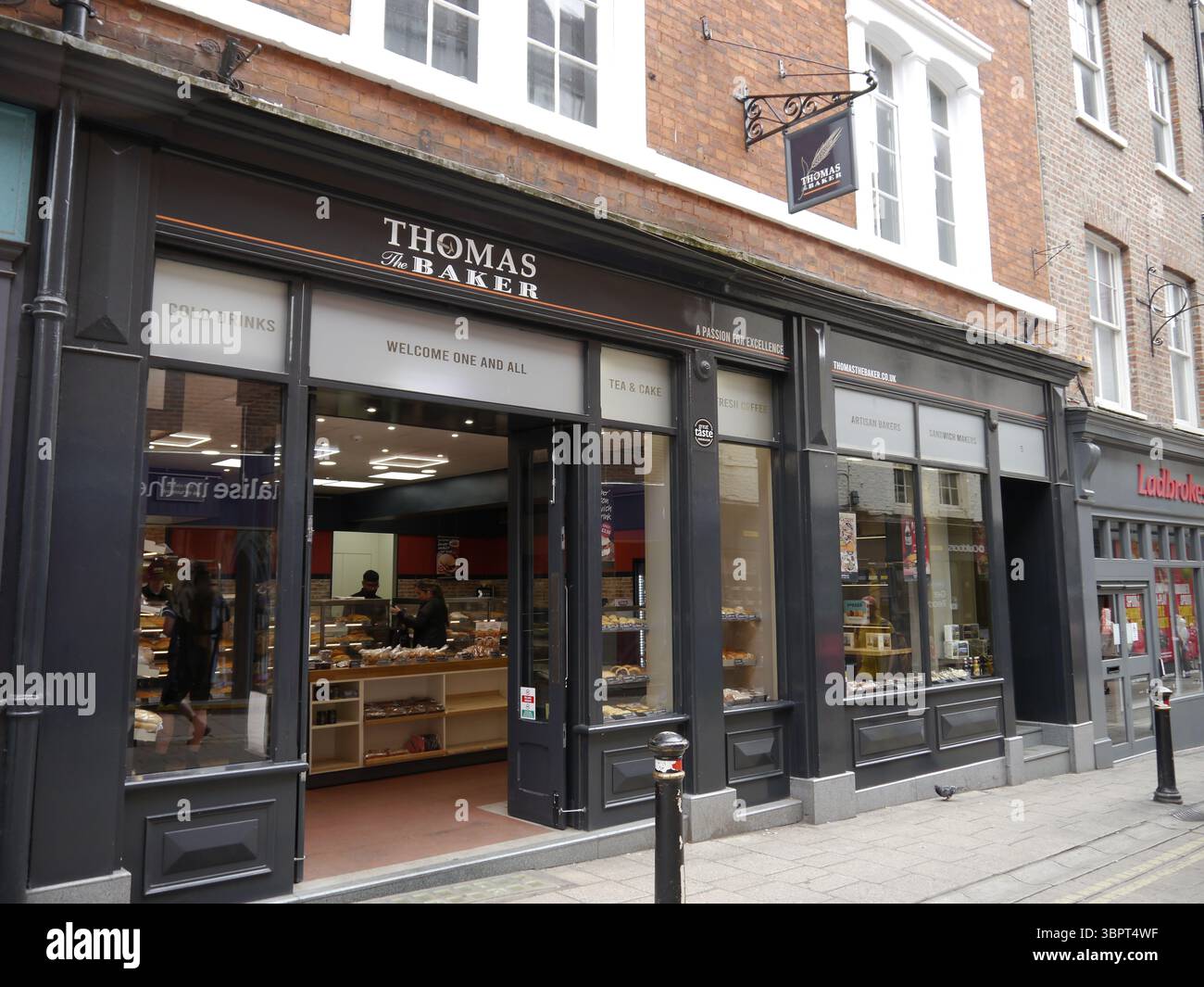 Thomas the Baker Corporate logo signs in York City centre in June 2025 ...