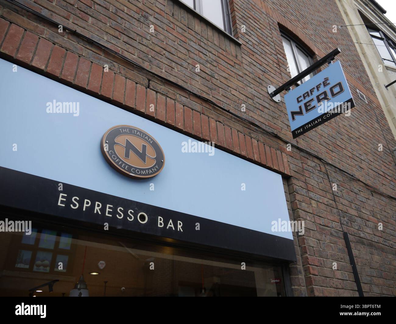 café Nero coffee shop cafe Corporate logo signs in York City centre in ...