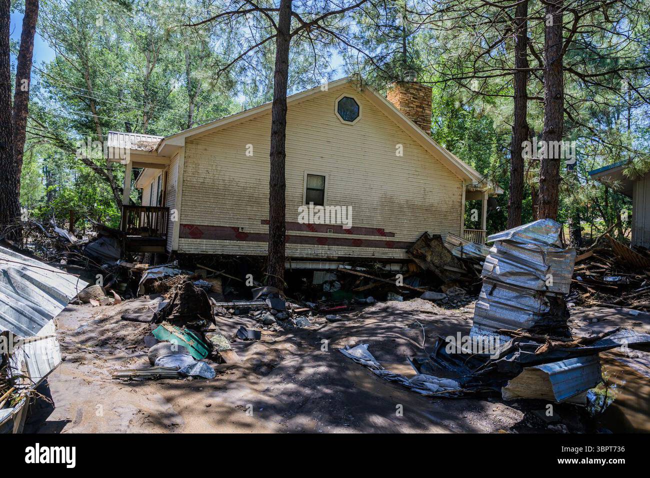 Residents of the town of Ruidoso, N.M., Wednesday, July 9, 2025, came ...