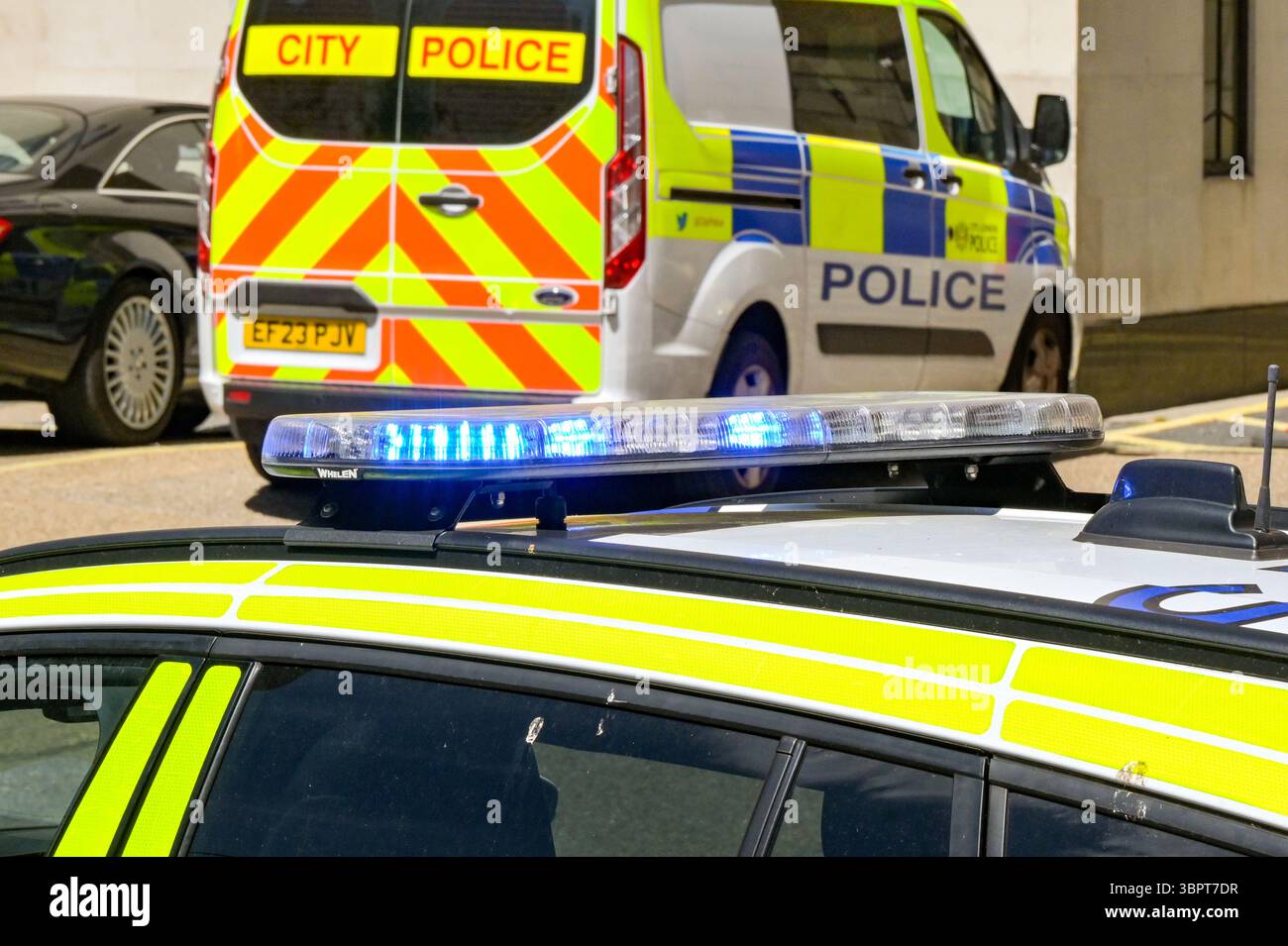 London, England, UK - 4 July 2025: Close up of the flashing blue lights ...