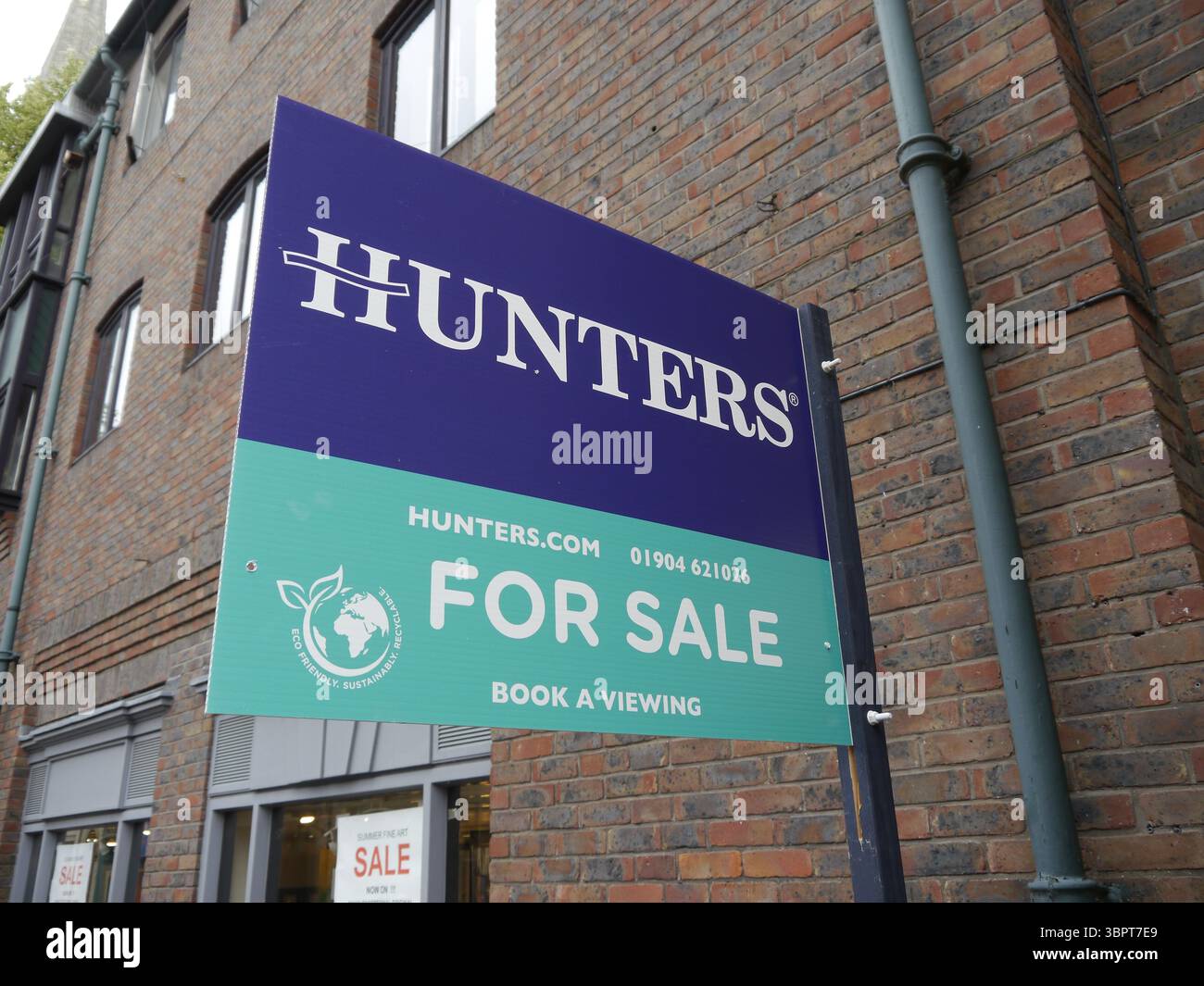 Hunters estate agent Corporate logo signs in York City centre in June ...