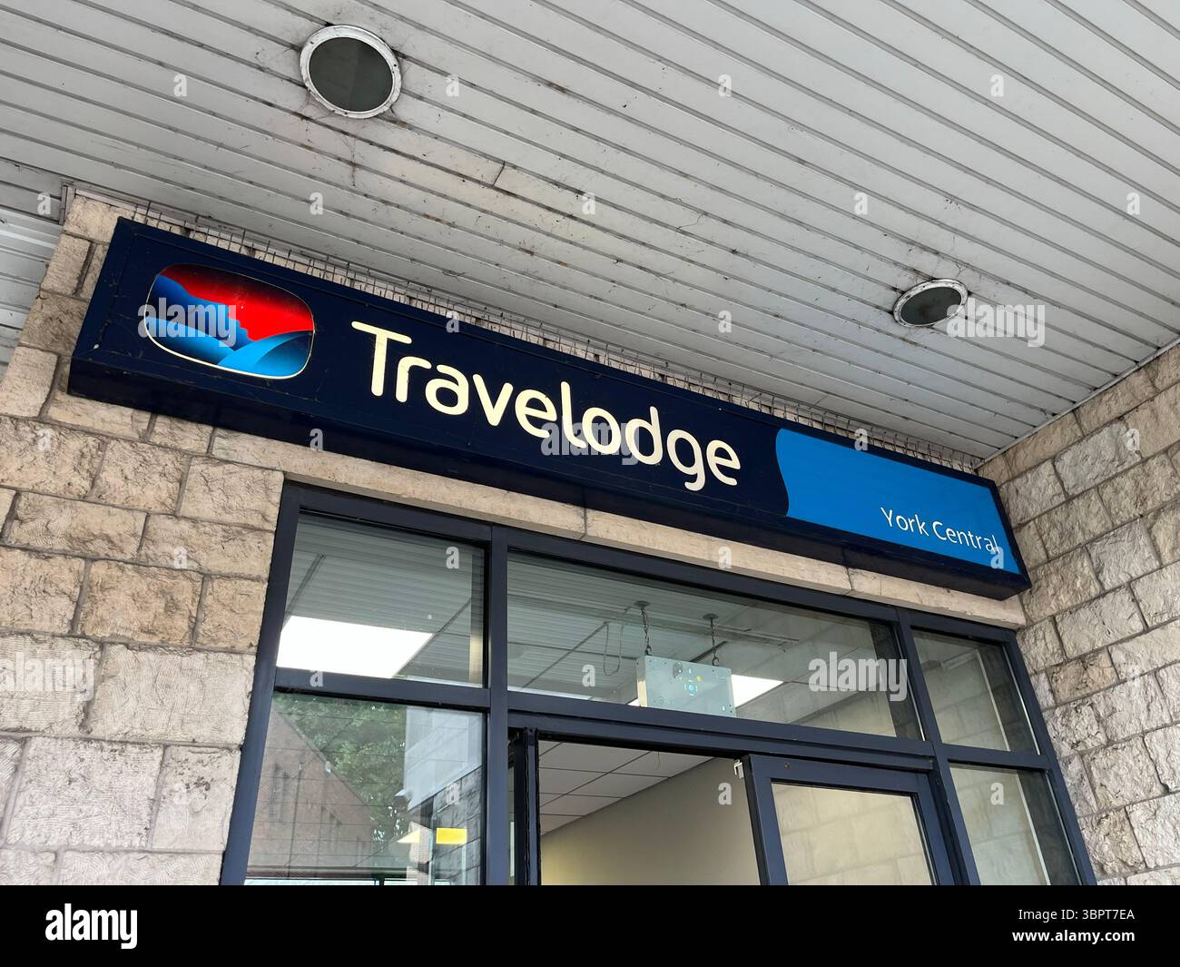 Travelodge hotels Corporate logo signs in York City centre in June 2025 ...