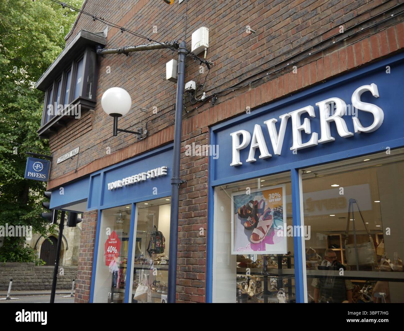 pavers style shop Corporate logo signs in York City centre in June 2025 ...