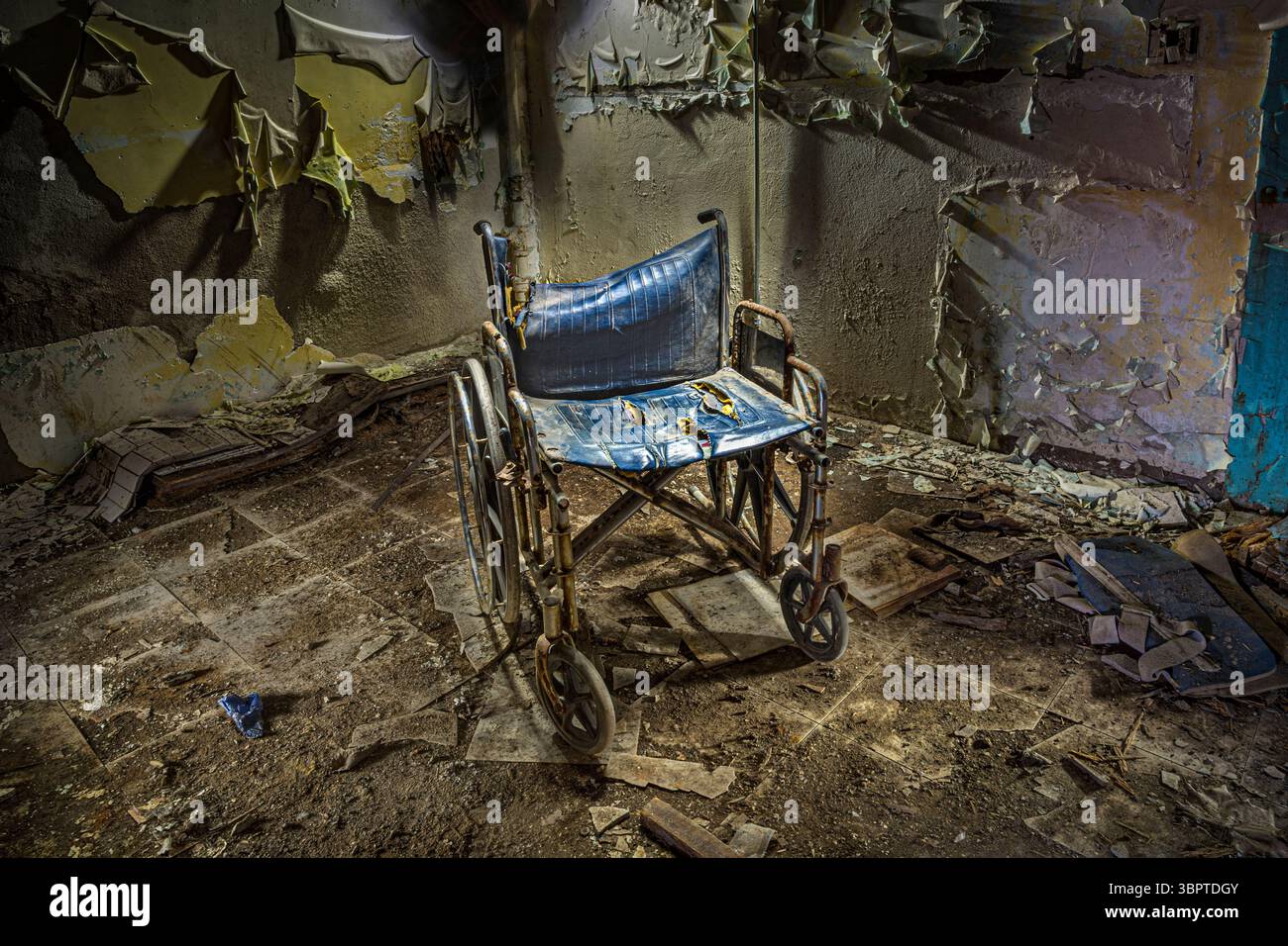 Lone wheelchair in abandoned hospital, Indiana USA Stock Photo - Alamy