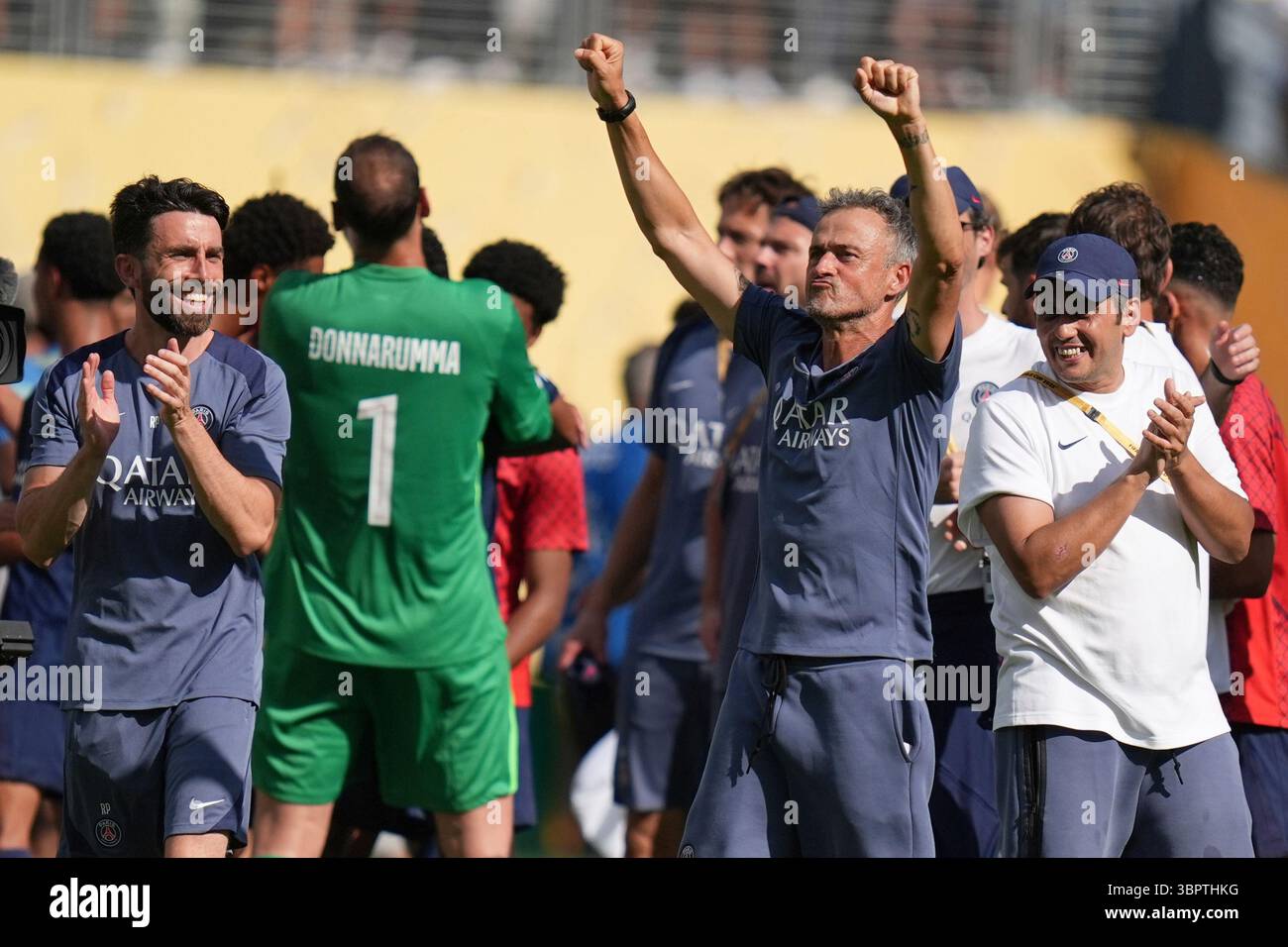 Paris Saint-Germain manager Luis Enrique salutes fans after the Club ...