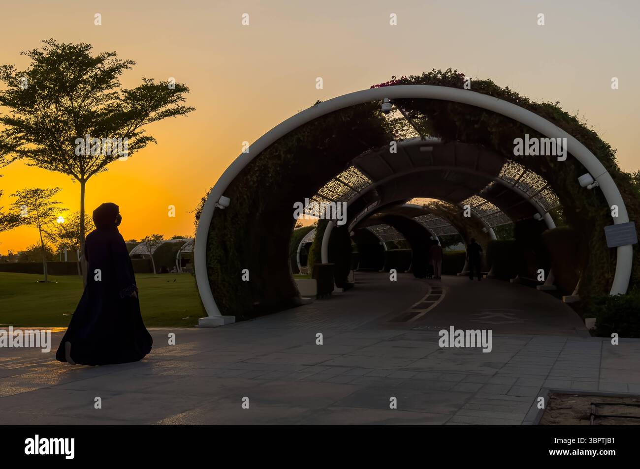 SUMMER IN QATAR People walk through the world s longest air-conditioned ...