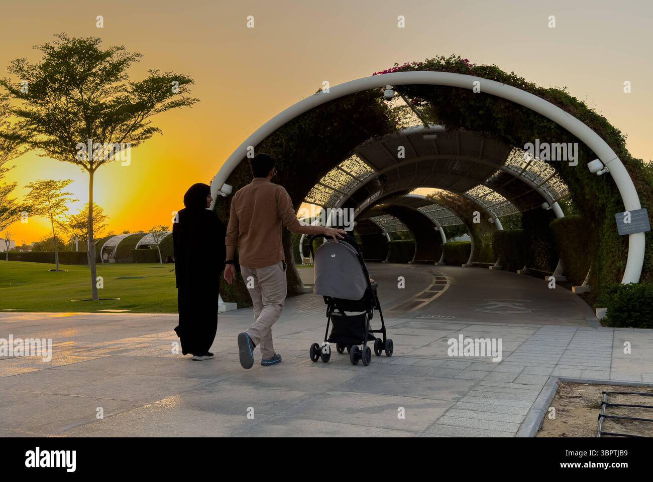 SUMMER IN QATAR People walk through the world s longest air-conditioned ...