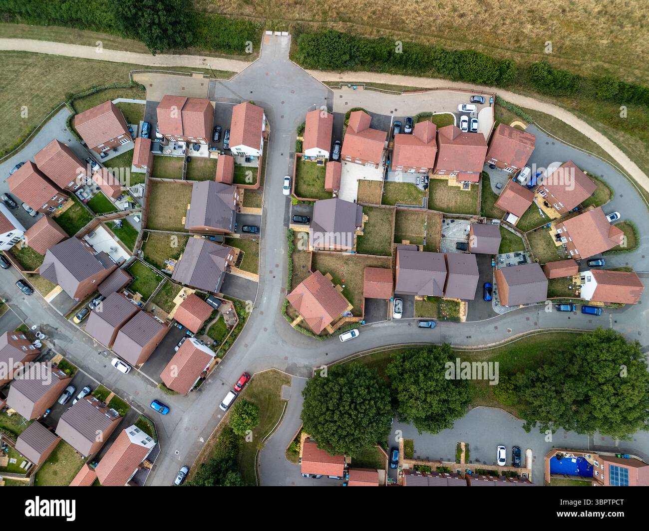 Aerial view of a contemporary suburban housing development with ...