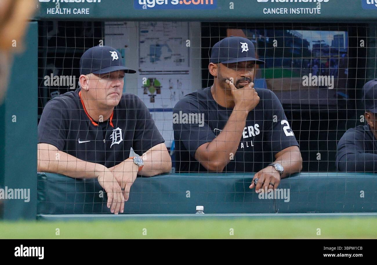 Detroit Tigers manager A.J. Hinch and bench coach George Lombard, right ...