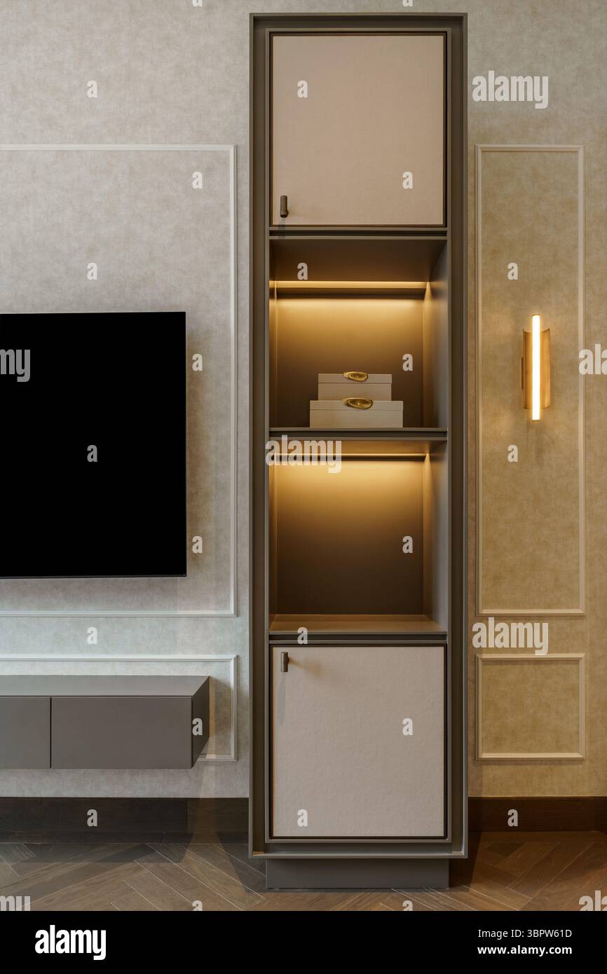 Modern entertainment wall with a TV flanked by tall, custom built-in ...