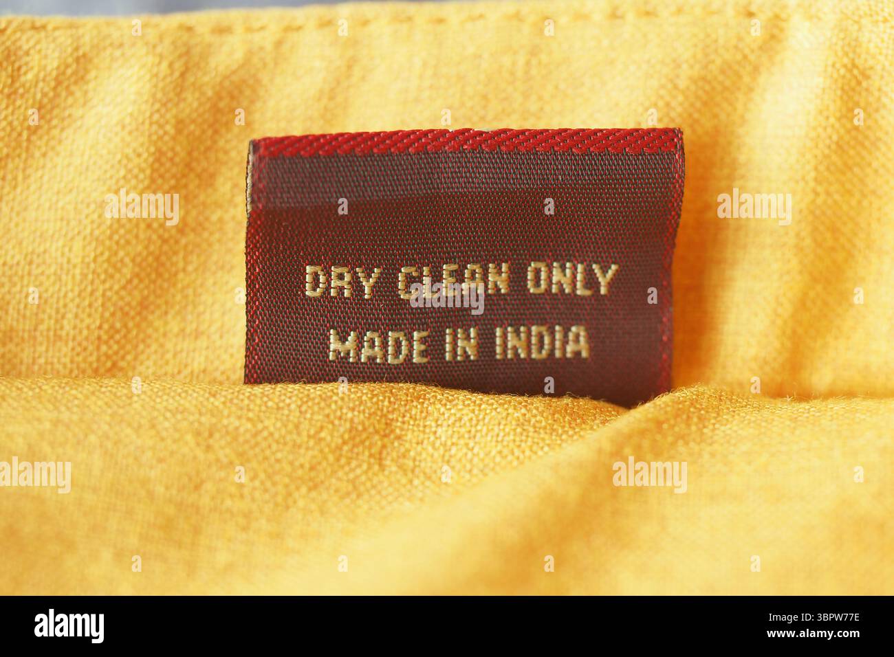 Care label showing dry clean instructions on fabric Stock Photo - Alamy