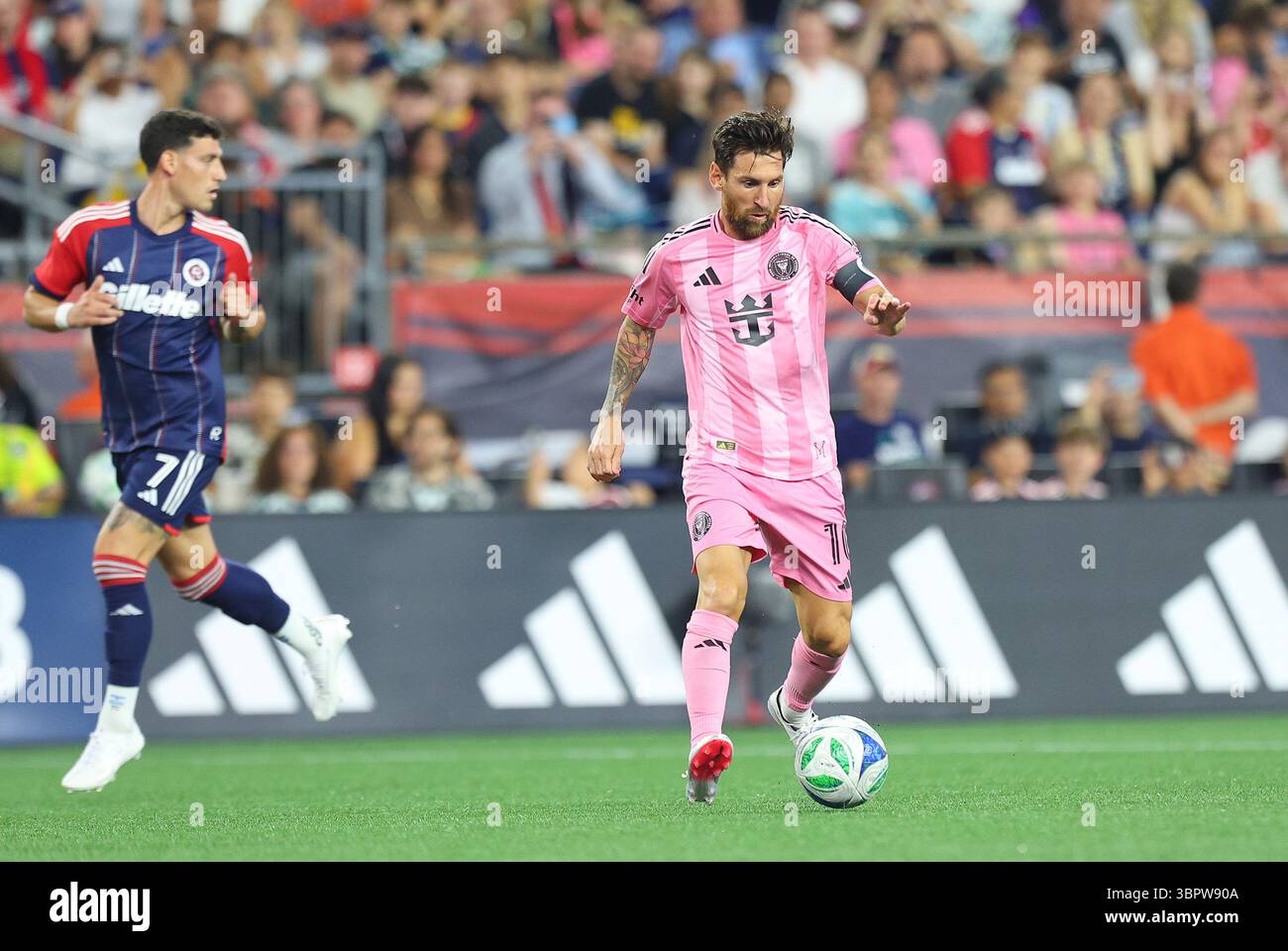 FOXBOROUGH, MA - JULY 09: Lionel Messi #10 of Inter Miami controls the ...