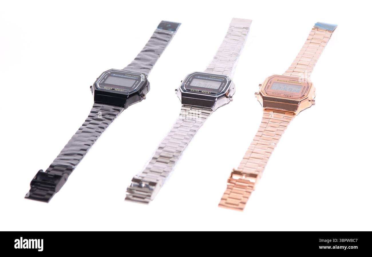 Different watches with electronic dial on white background. Electronic ...
