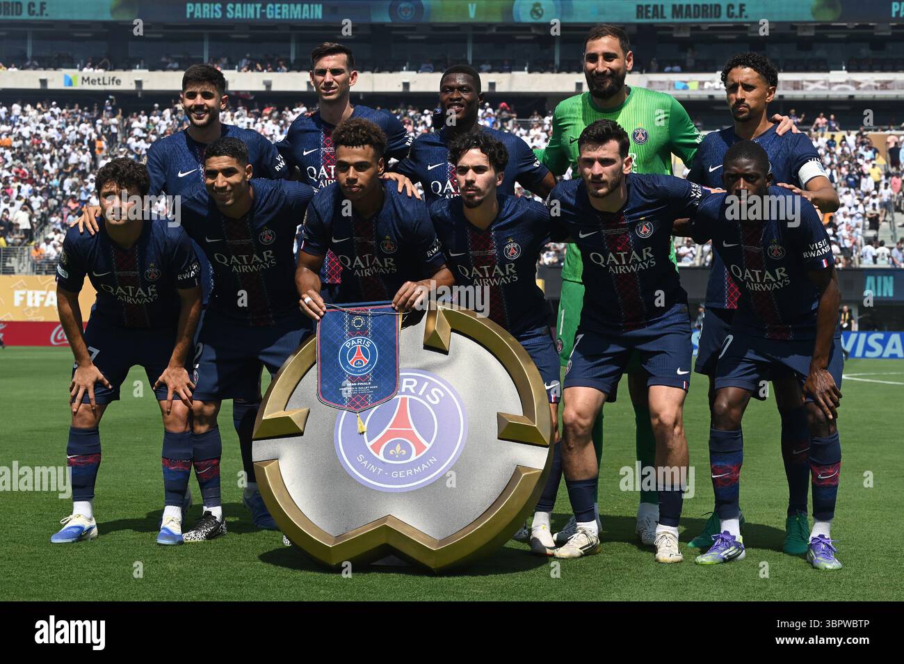 Starting line-up for Paris Saint-Germain team pose during the opening ...