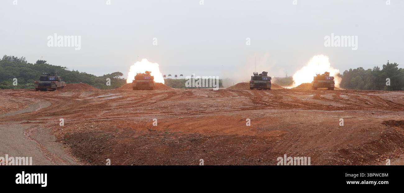 M1A2T Abrams Main Battle Tanks fire during a military live-fire ...