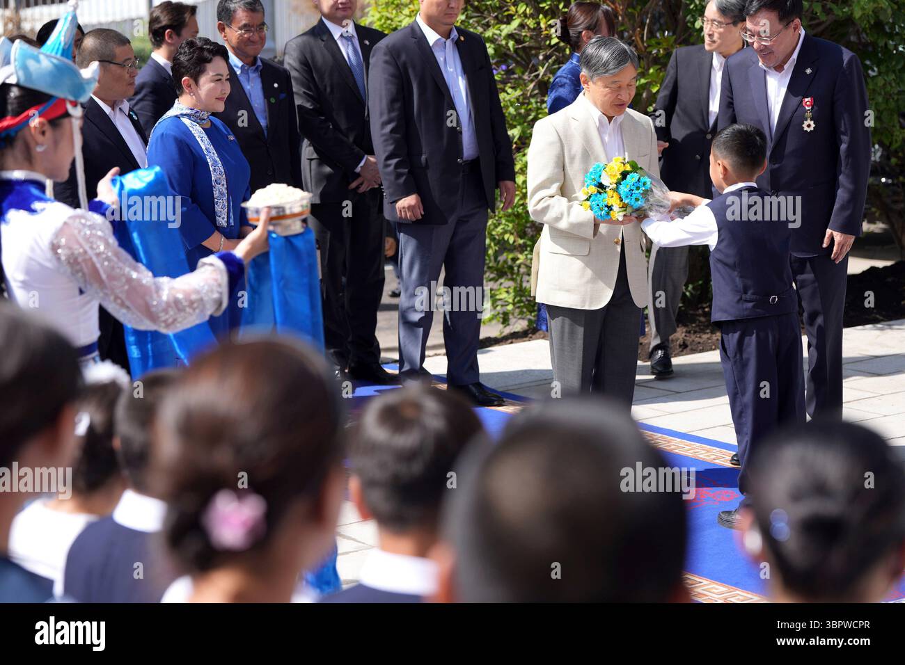 Students welcome Japan's Emperor Naruhito at the Shine Mongol School in ...