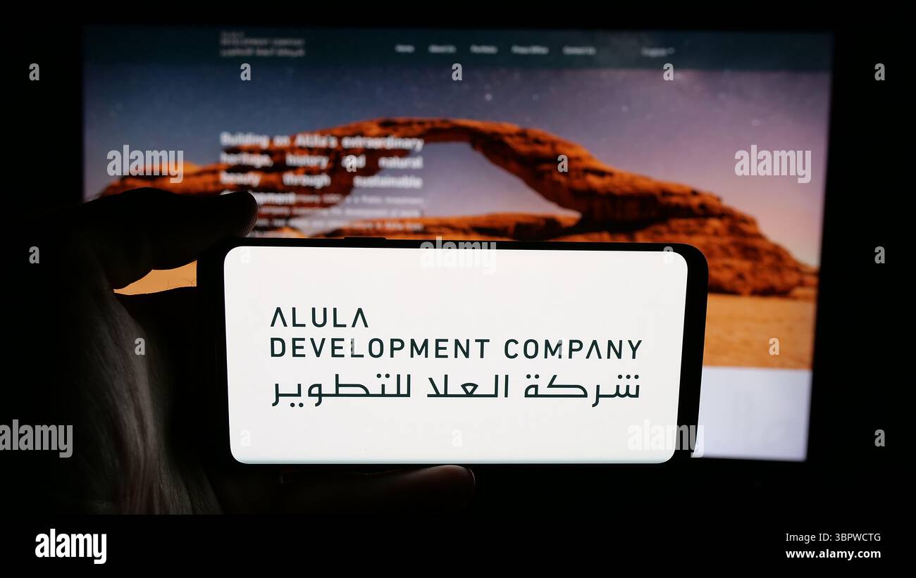 In this photo illustration, a cellphone with the logo of business Al ...