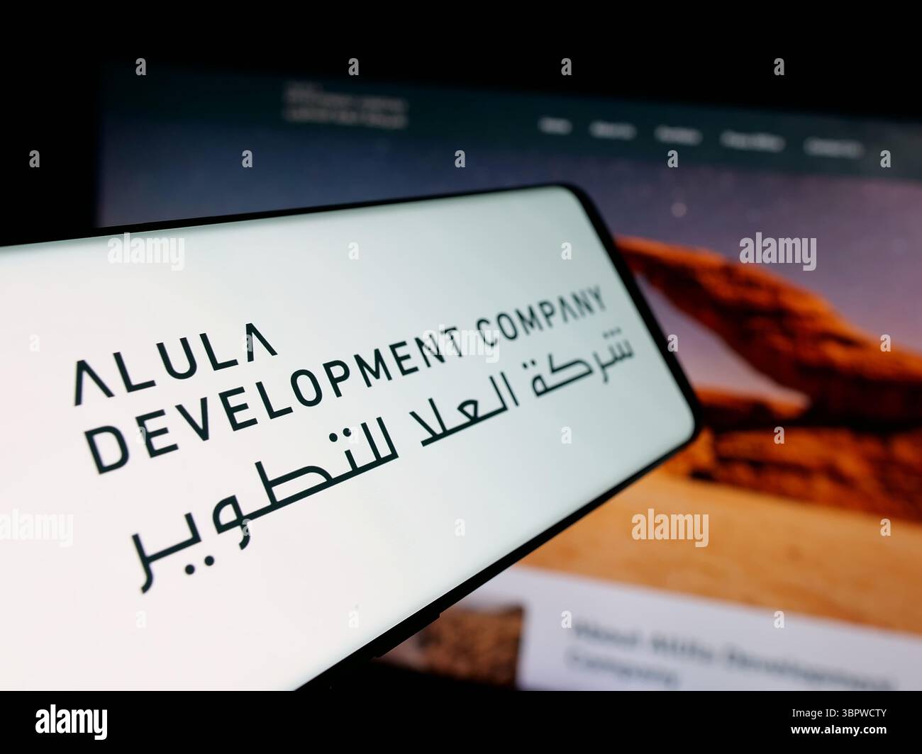 In this photo illustration, a smartphone with the logo of business Al ...