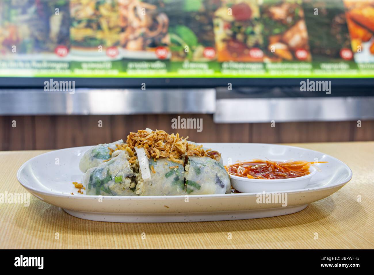 Fresh Vietnamese Spring Rolls with Pork on a table in a fast food ...