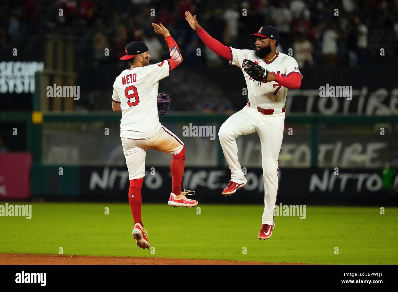 Los Angeles Angels' Zach Neto, left, and Jo Adell congratulate each ...
