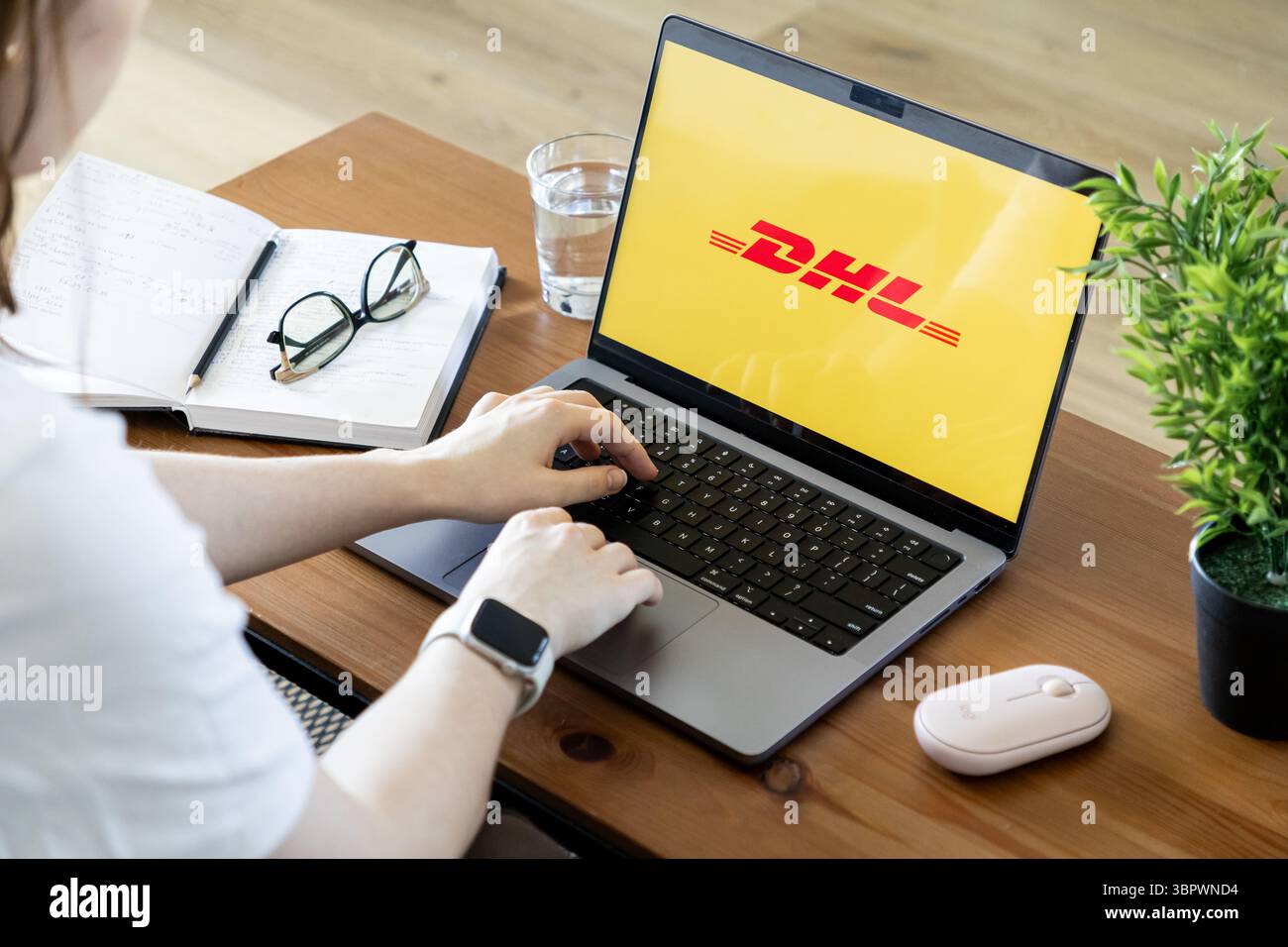 Poznan, Poland - June 15, 2025: DHL branding prominently featured on a ...
