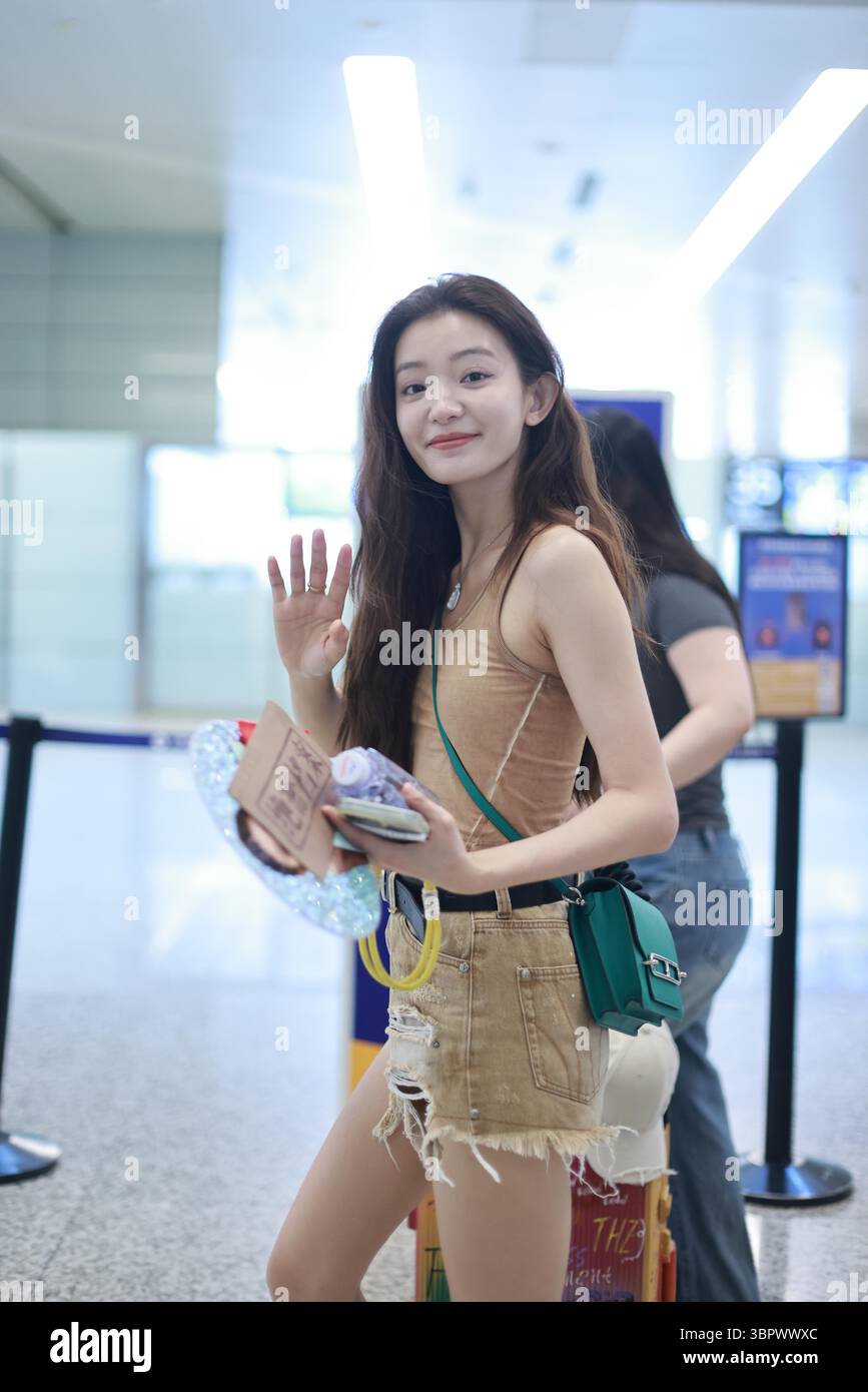 Chinese actress Luo Yutong appears at the airport in Shanghai, China, 8 July, 2025 Stock Photo ...