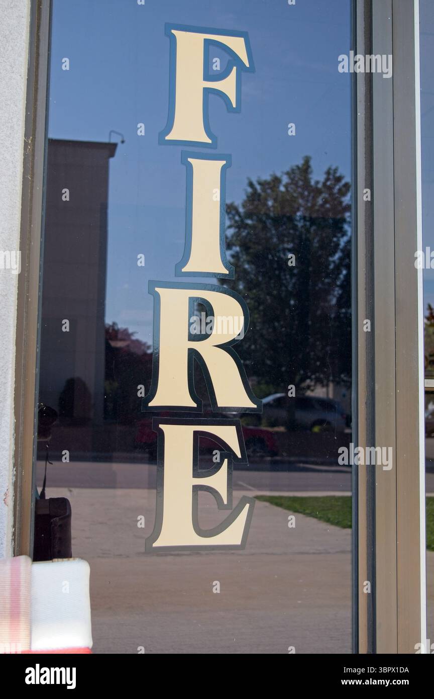 Vertical lettering on fire station window that reads Fire Stock Photo ...