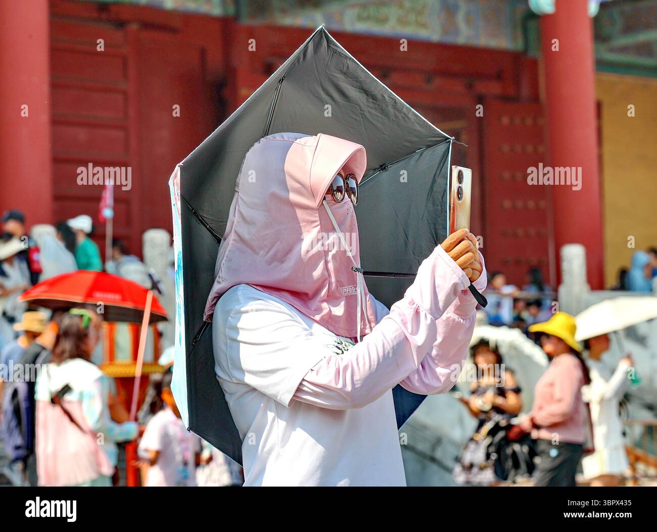 Tourists visit Tiantan Park amid hotwave in Beijing, China, 7 July ...