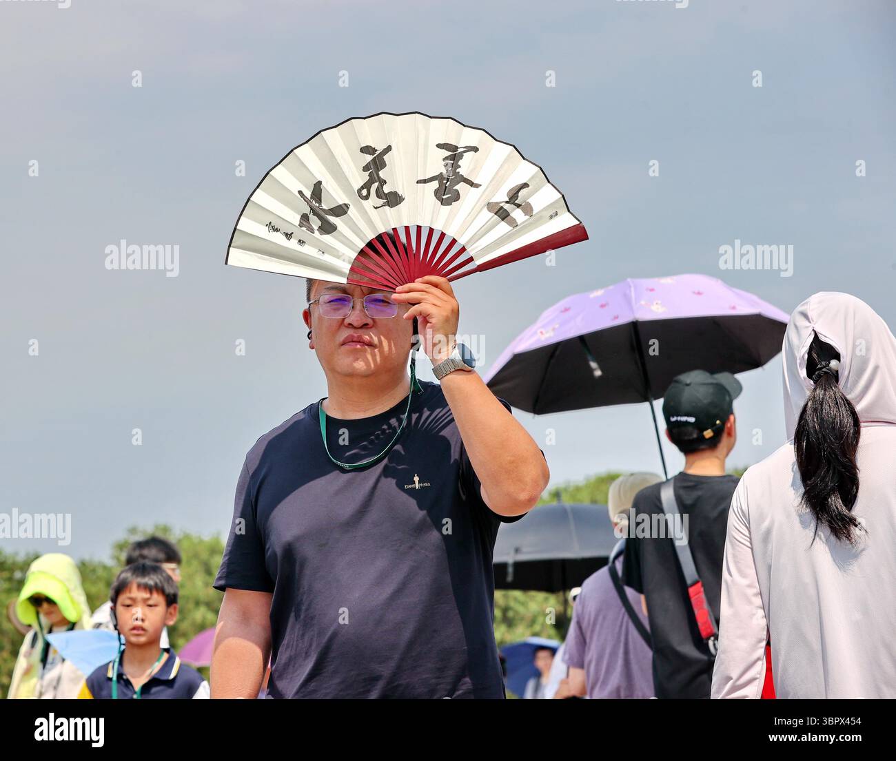 Tourists visit Tiantan Park amid hotwave in Beijing, China, 7 July ...
