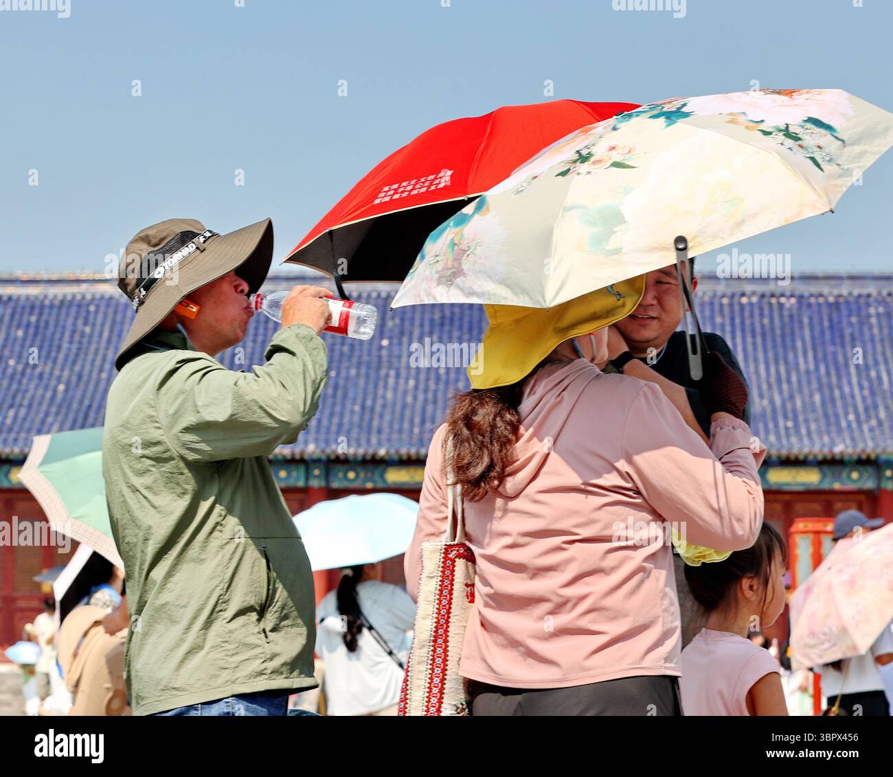 Tourists visit Tiantan Park amid hotwave in Beijing, China, 7 July ...