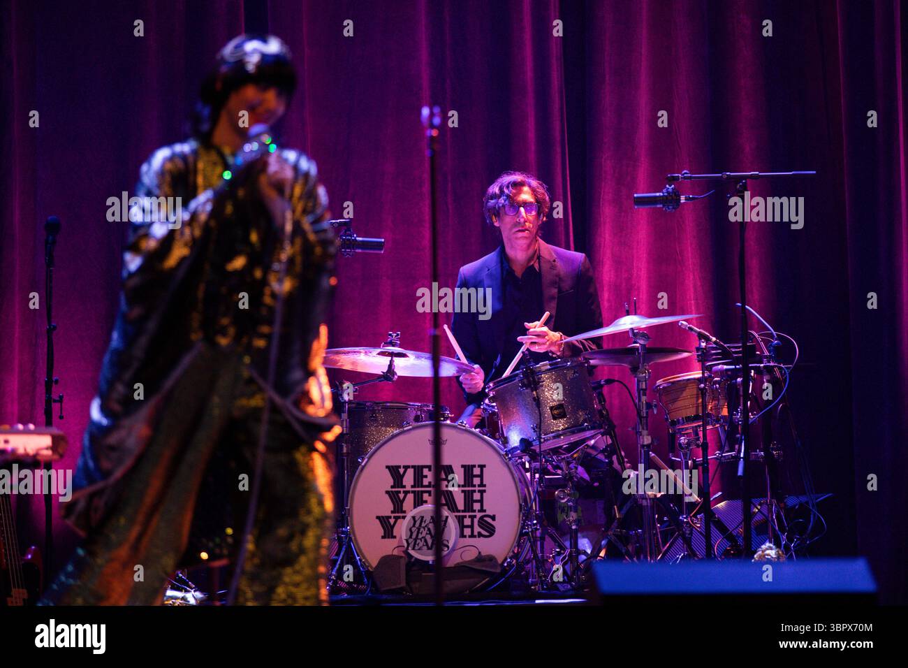 Karen O, left, and Brian Chase of the Yeah Yeah Yeahs perform on ...