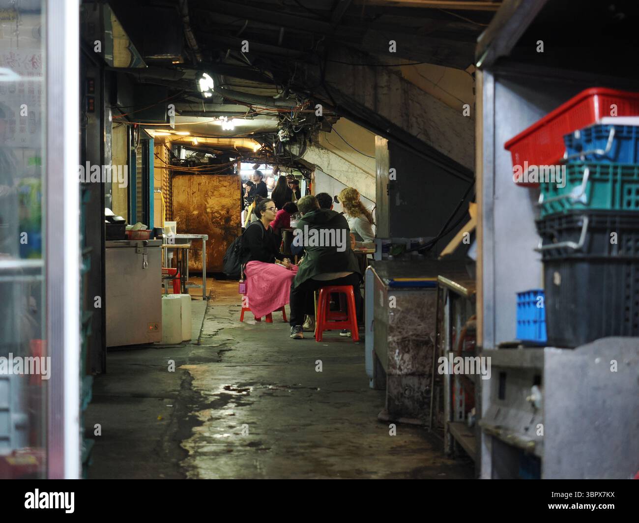 Customers Dining in a Small Alleyway at Night Market Stock Photo - Alamy