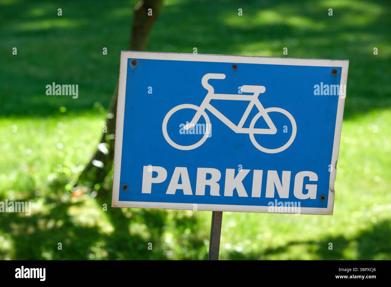 Sign indicates designated parking hi-res stock photography and images ...