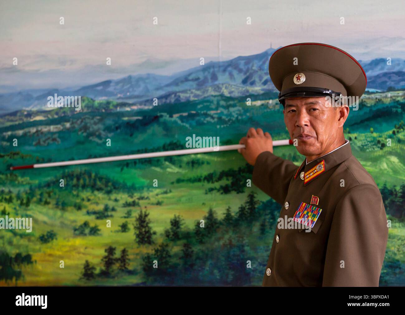 Soldier in the DMZ in front of the map of the wall, North Hwanghae ...