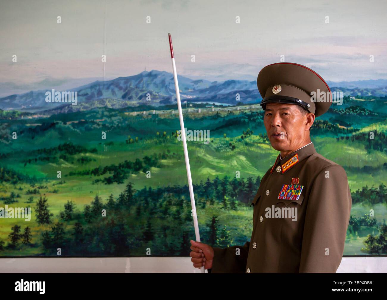 Soldier in the DMZ in front of the map of the wall, North Hwanghae ...