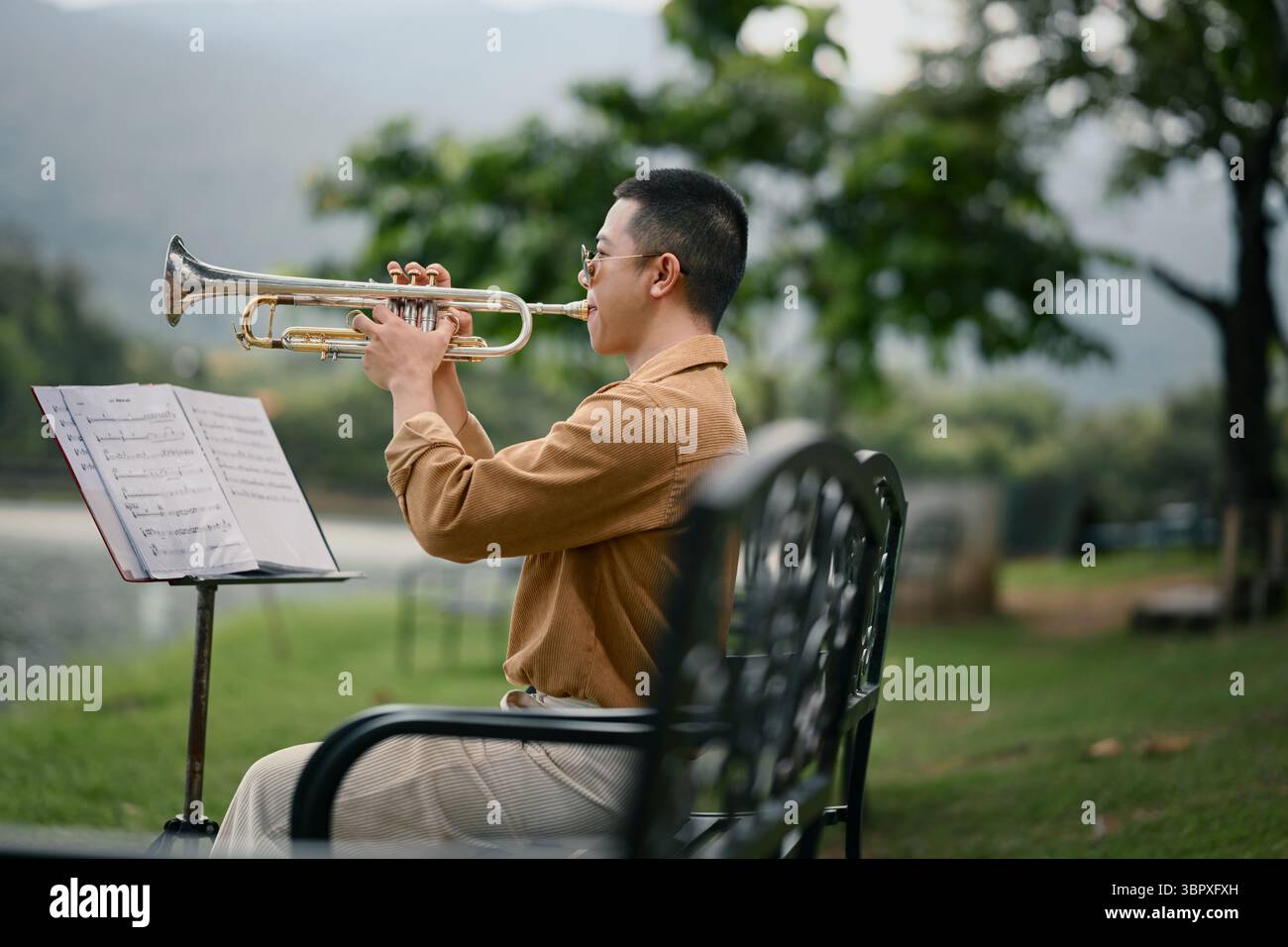 Artistic expression through music in the beauty of nature Stock Photo ...