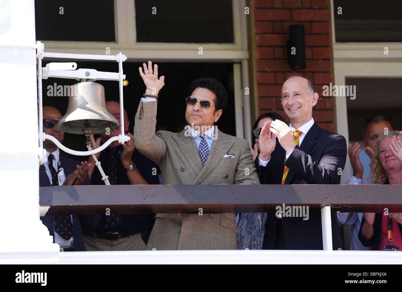 Sachin Tendulkar rings the five minute bell during day one of the Third ...