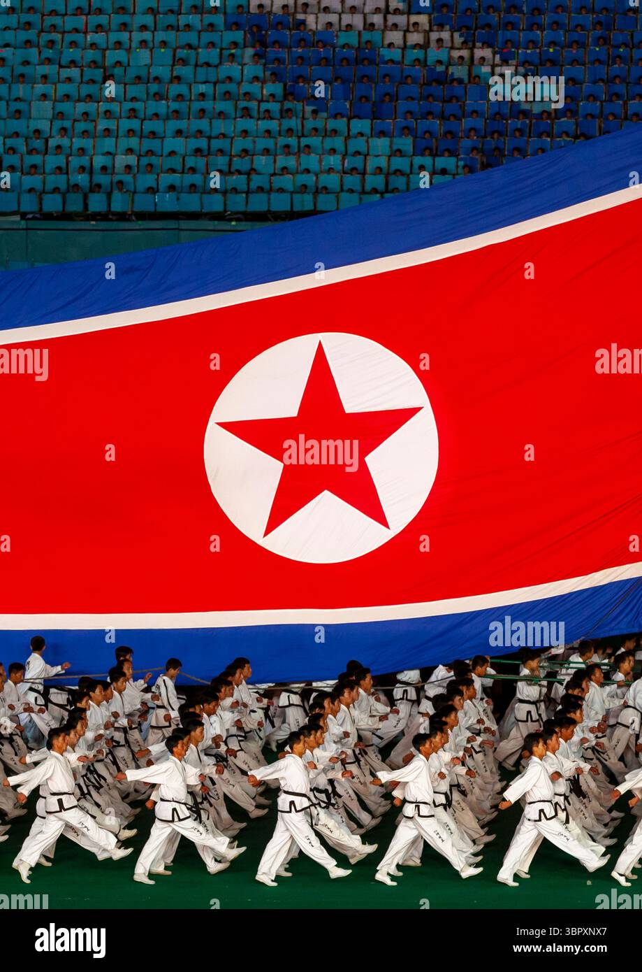 North Korean taekwondo team with a giant flag during the Arirang, DGC ...
