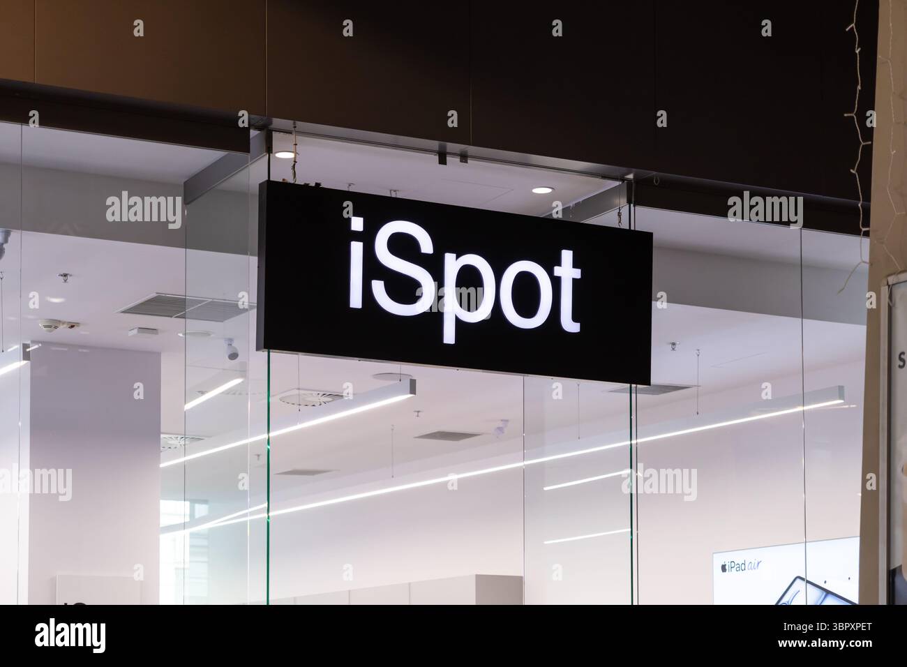 Poznan, Poland - June 18, 2025: iSpot illuminated brand sign ...