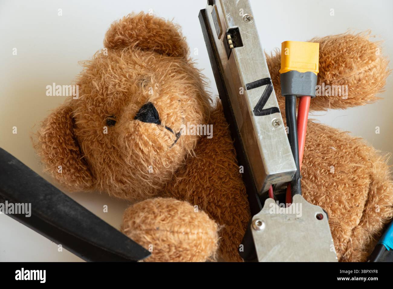 Teddy bear and Russian combat drone on white background Stock Photo - Alamy