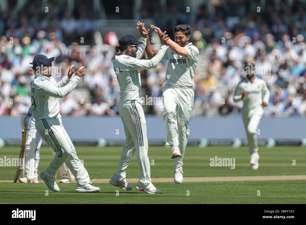 Nitish Kumar Reddy of India celebrates the wicket of Ben Duckett of ...