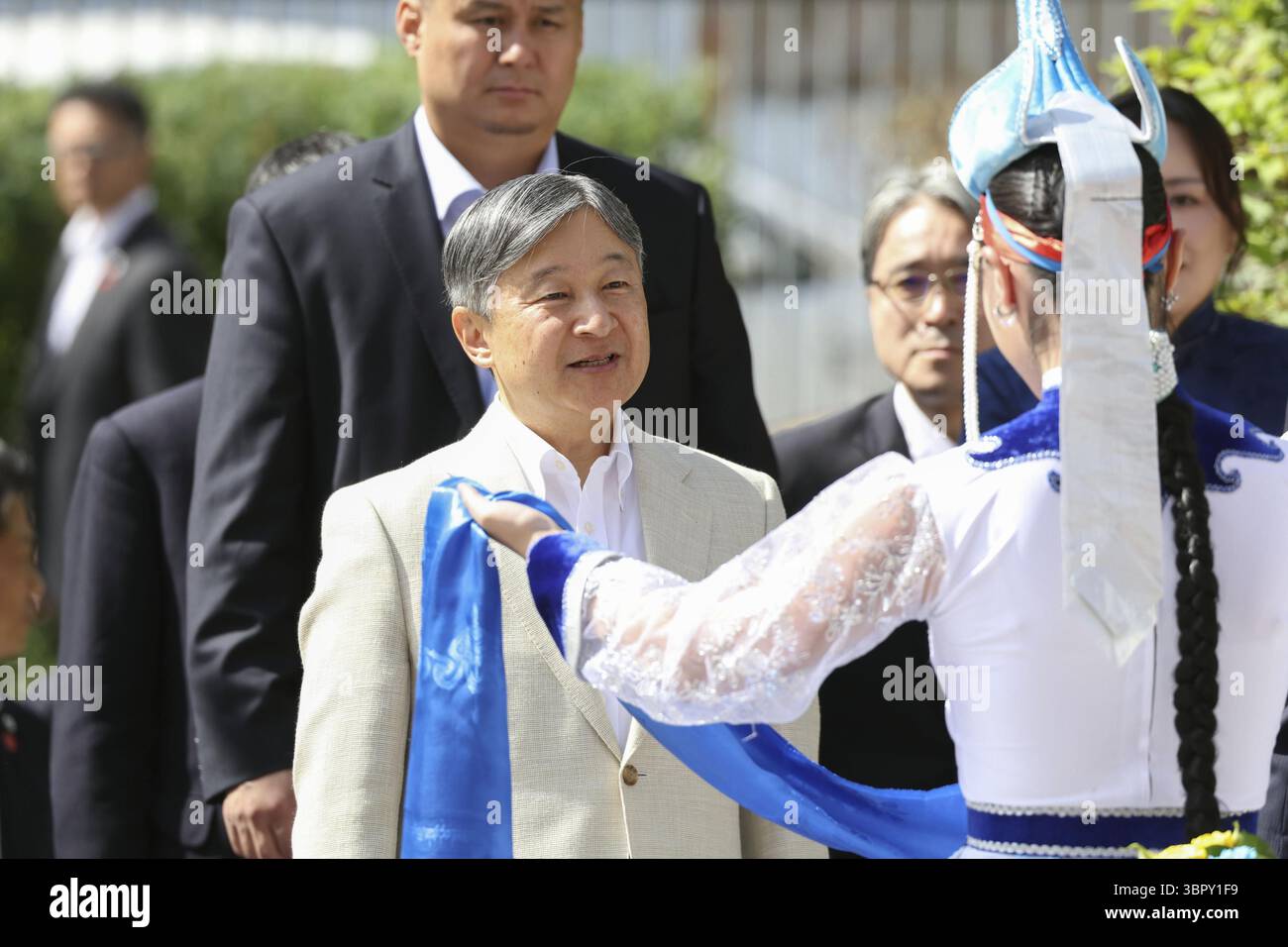 Japanese Emperor Naruhito (C) is greeted upon arriving at Shine Mongol ...