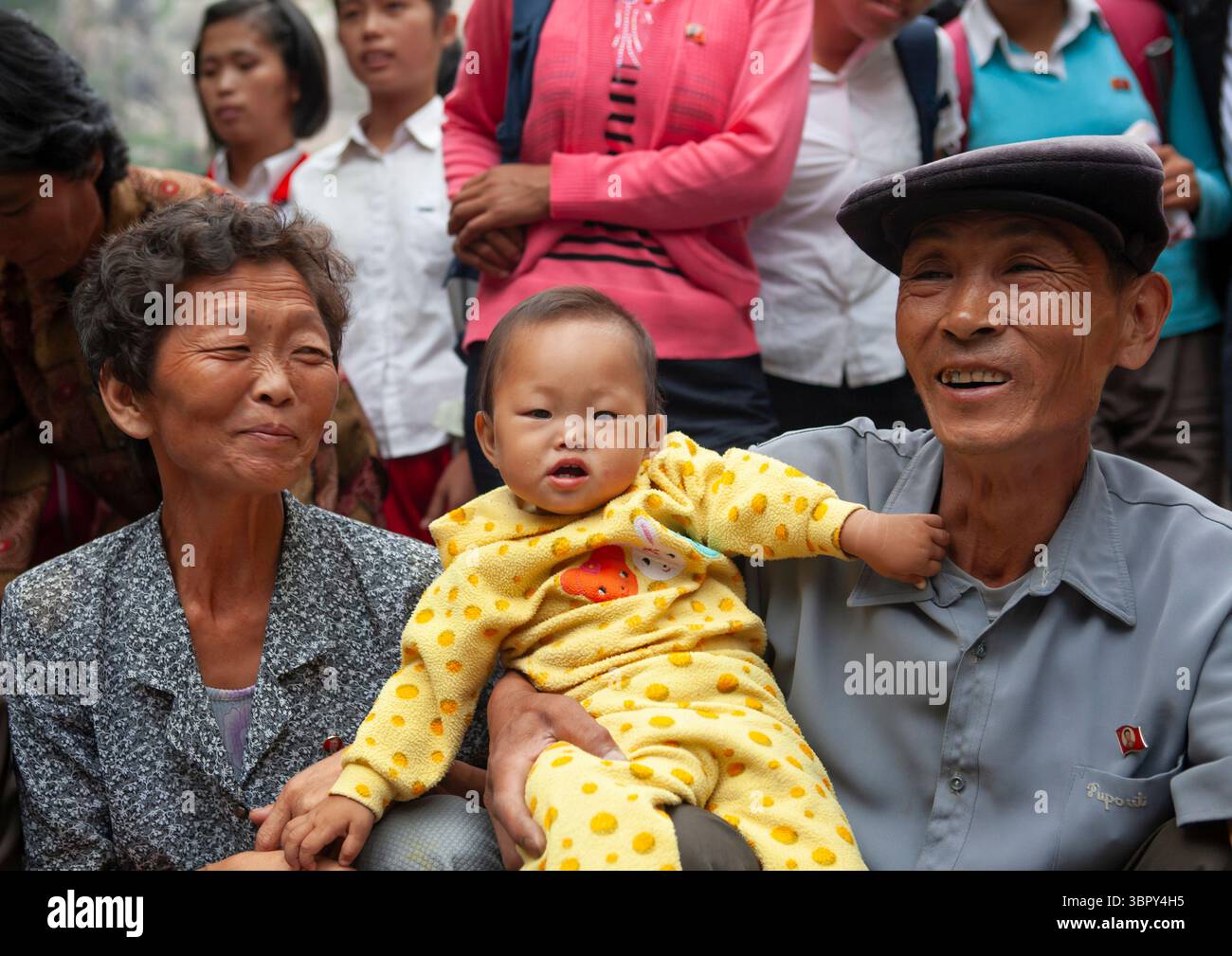 North Korean family posing for a picture in a park, North Hwanghae ...